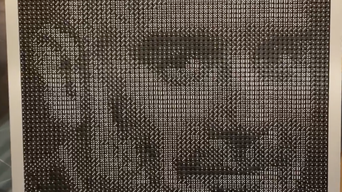 Le portrait de Pep Guardiola a été réalisé avec des dés